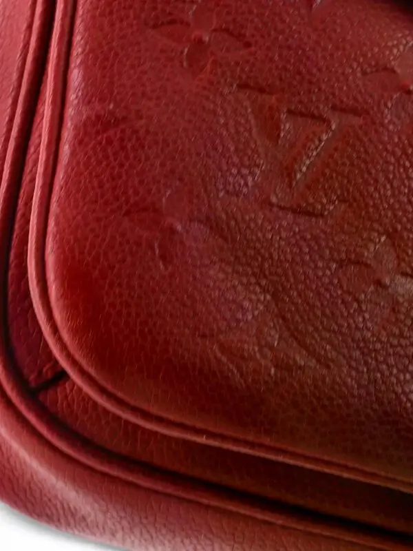 LOUIS VUITTON Pochette Metis Monogram Empreinte Leather - Red