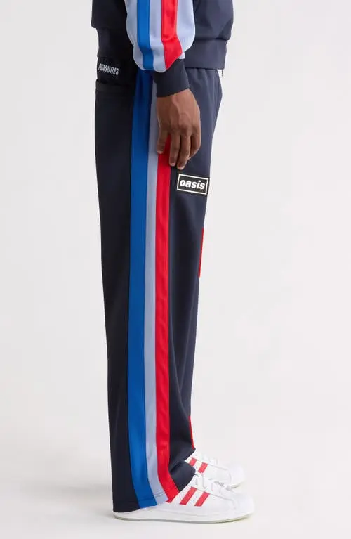 PLEASURES X Oasis Forever Track Pants