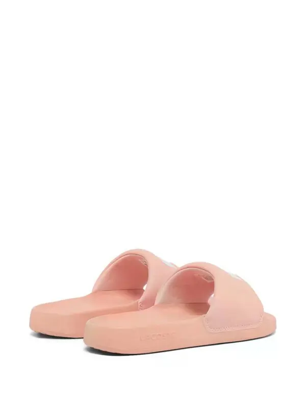 Lacoste Serve Logo Slides