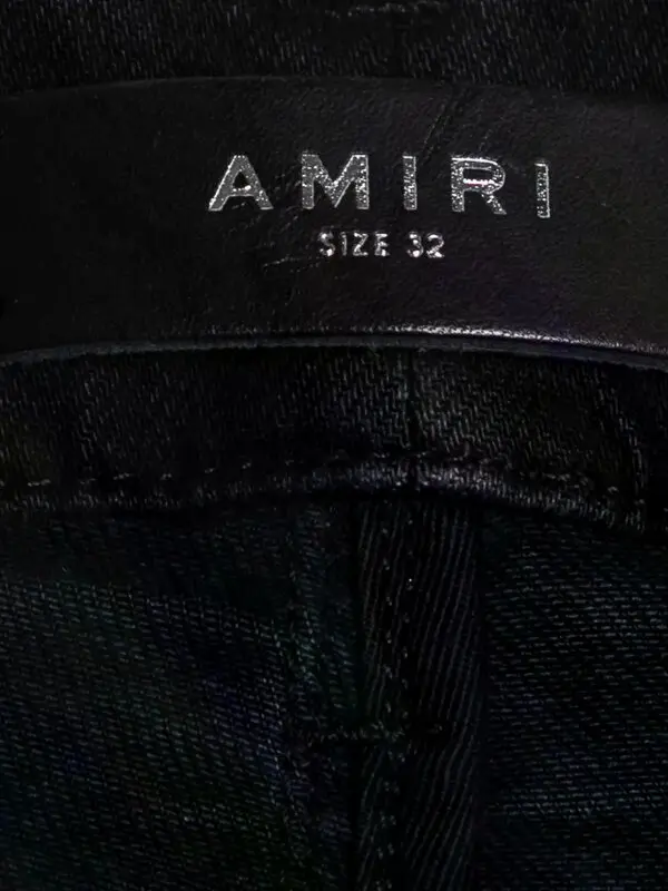 Amiri Distressed Patchwork Jeans