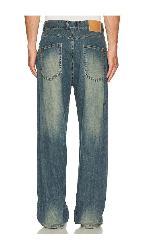 We11Done Piercing Detail Denim Jeans - Blue