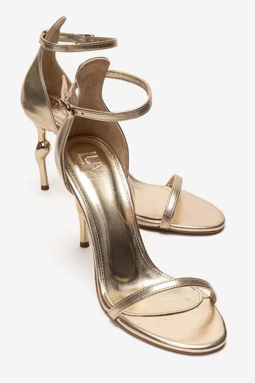 PROLOGUE SHOES Yelena Ankle Strap Stiletto Pumps - Gold