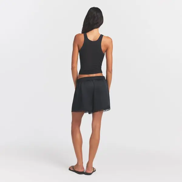 SKIMS Lace Boxer | Black | | Woven Shine
