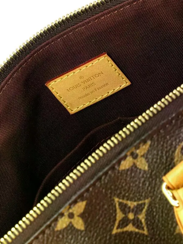 LOUIS VUITTON Rivoli Handbag Monogram Canvas Mm - Brown