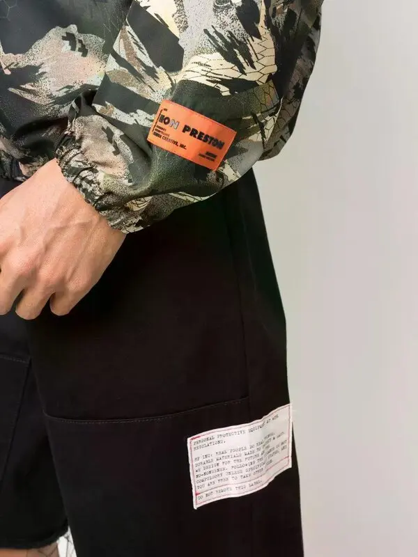 Heron Preston Logo-tape Camouflage Windbreaker Jacket