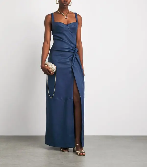 simkhai leather dress simkhai blood orange leather midi dress. This shape flatters the body with  a high slit and asymmetrical ruching at the waist. Pair with heels or flat  sandals depending on the occasion. 
