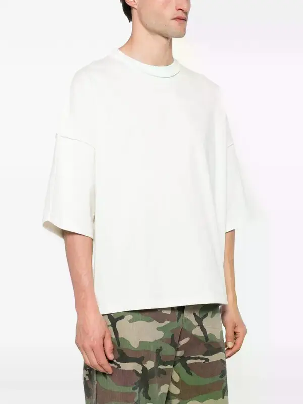 STAY HUMAN ON EARTH Dropped-shoulders T-shirt