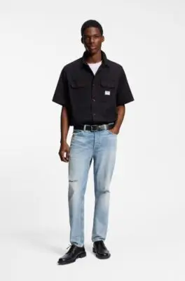 Hugo Tapered-fit Jeans In Distressed Denim - Turquoise