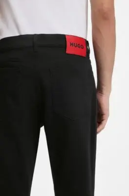 Hugo Tapered-fit Jeans In Thermo-regulating Denim
