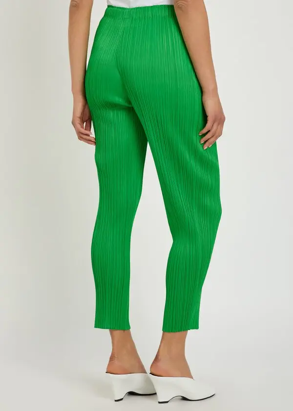 Issey Miyake Pleated Tapered-leg Woven Trousers