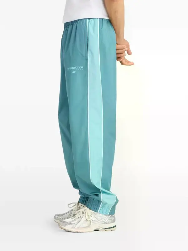 NEW BALANCE Trackside Woven Track Pants