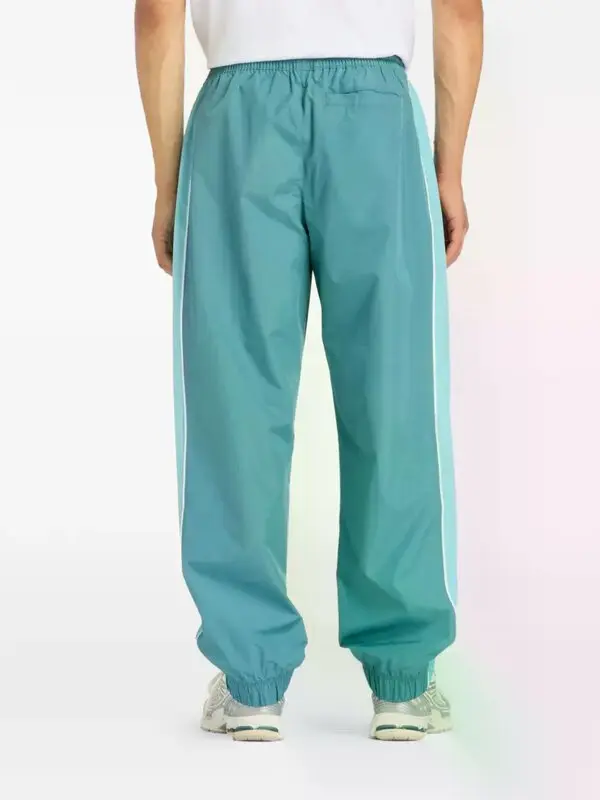 NEW BALANCE Trackside Woven Track Pants