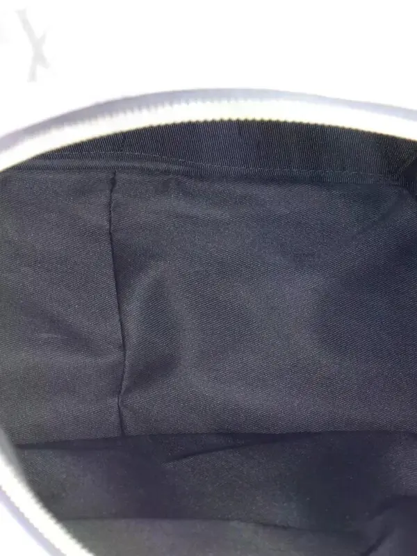 LOUIS VUITTON Discovery Monogram Taigarama Pm Backpack - Metallic