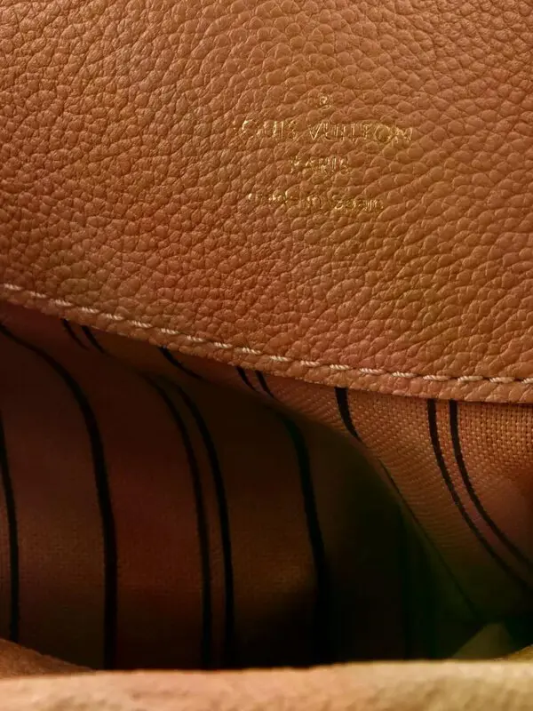 LOUIS VUITTON Bagatelle Monogram Empreinte Leather Hobo Bag - Neutrals