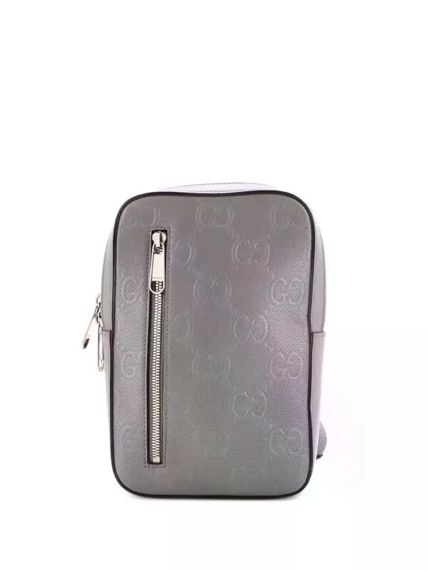 Gucci Sling Gg Embossed Perforated Leather Backpack