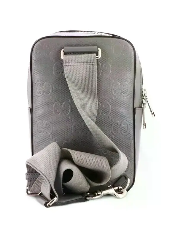 Gucci Sling Gg Embossed Perforated Leather Backpack