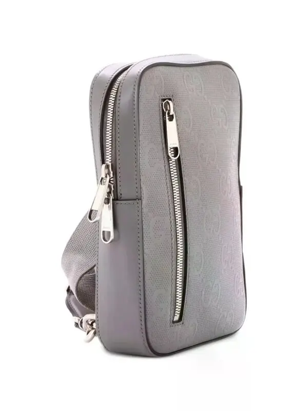 Gucci Sling Gg Embossed Perforated Leather Backpack