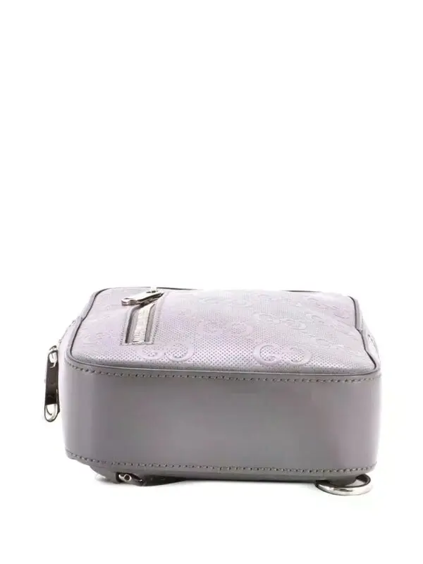 Gucci Sling Gg Embossed Perforated Leather Backpack