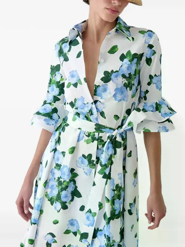 carolina herrera white shirt dress An homage to Carolina Herrera, this look features a crisp white shirt with  smocked cuffs over a ball skirt with pockets. Like the iconic designer,  this look blends elegance with cool effortlessly. #
