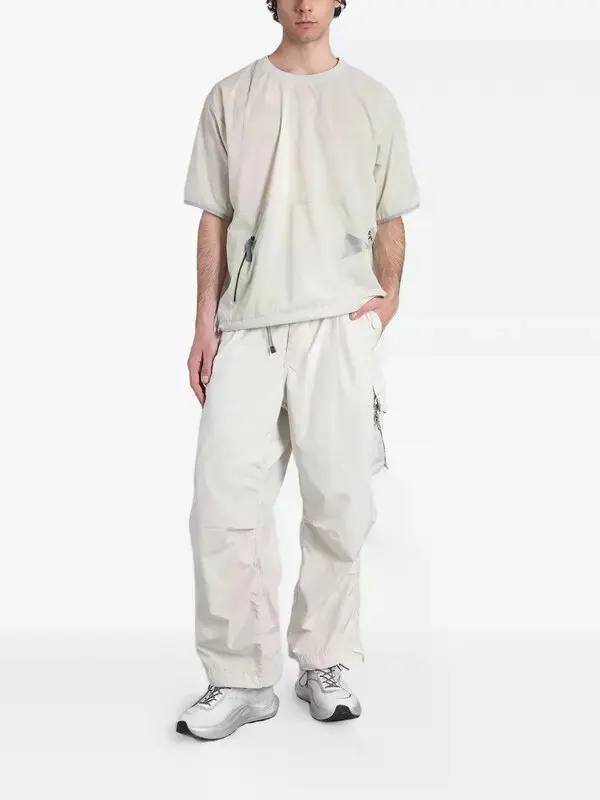 AND WANDER Pertex Quantum Air Logo-print Zip-pocket T-shirt