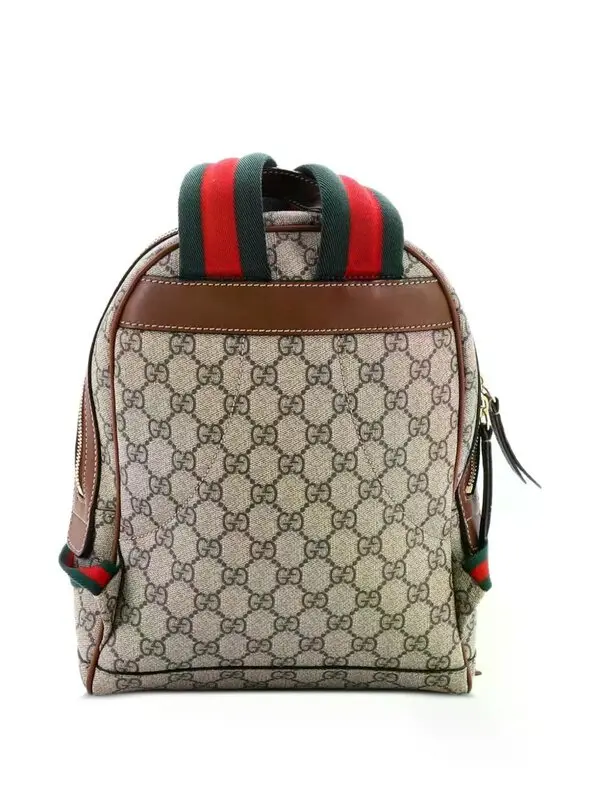 Gucci Zip Pocket Embroidered Gg Coated Canvas Small Backpack - Brown