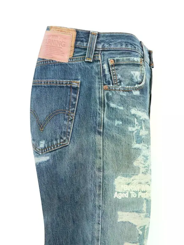BETTER WITH AGE Distressed Logo-print Jeans - Blue