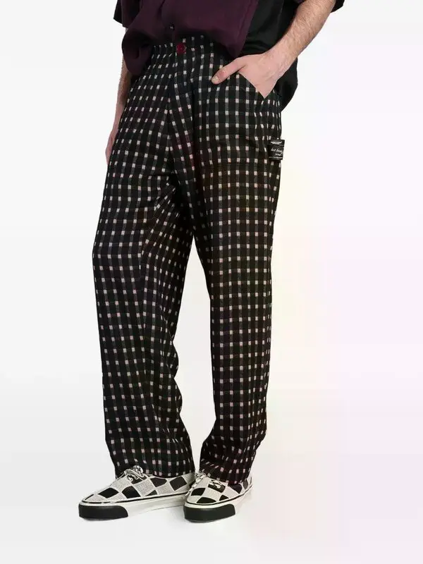 Undercover Check-pattern Trousers With Logo Patch
