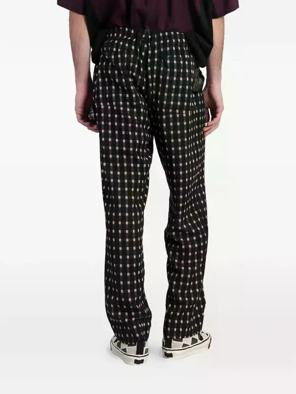Undercover Check-pattern Trousers With Logo Patch