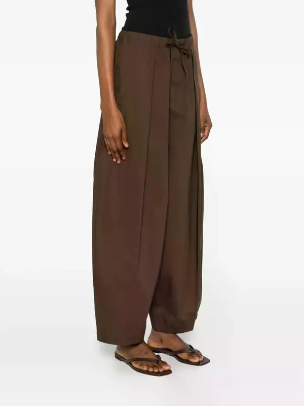 Sú Pleated Drawstring Palazzo Pants