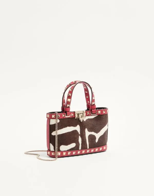 Valentino Garavani Rockstud Mini Shopping Bag In Pony-effect Calfskin - White/brown/red