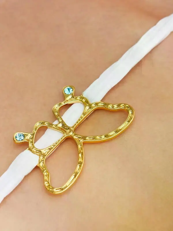 BEACH BUNNY Butterfly-appliqué Triangle Bikini Top