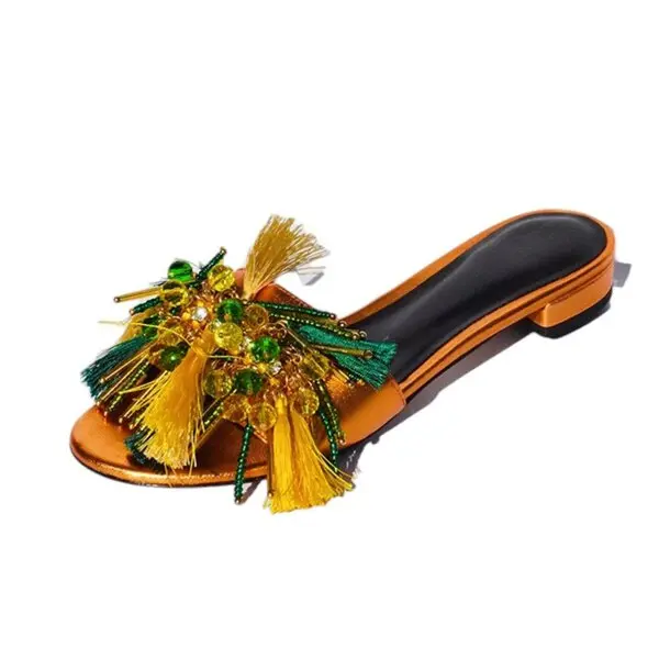 AETHRA SHOES Aeetes Embellished Tassel Slides