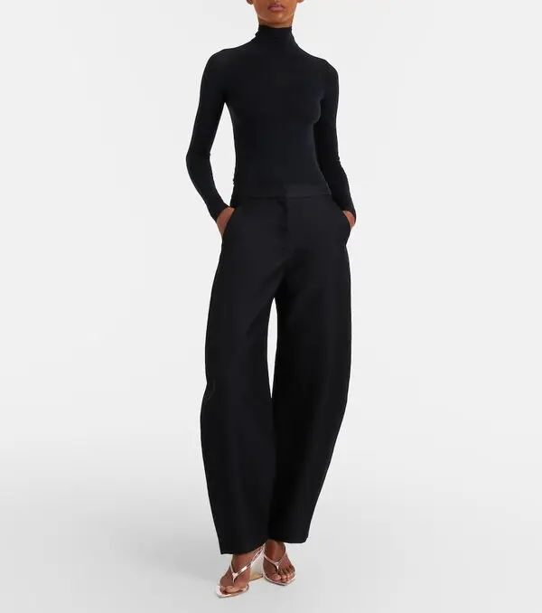 Alaïa Invisible Leather Wedge Thong Sandals