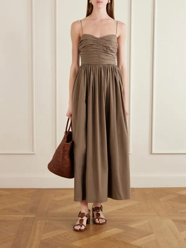 matteau dress Edition 1 2025 has arrived: @matteau 's new dresses float in airy cotton, brushed with a fresh green fan-print and shaped by delicate straps, ruched bodices, and billowing skirts that move effortlessly impact materials or ingredients Low Back Slip Dress -