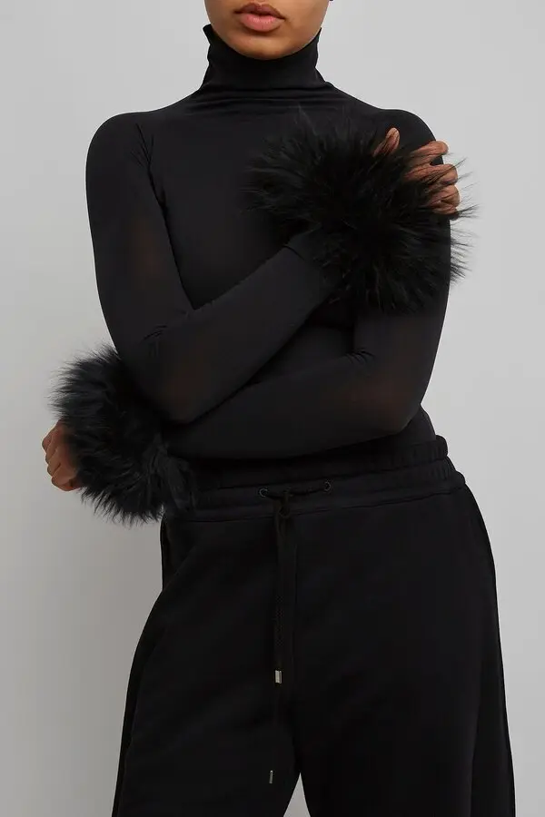 Alaïa Knitted Bodysuit With Fur Cuffs