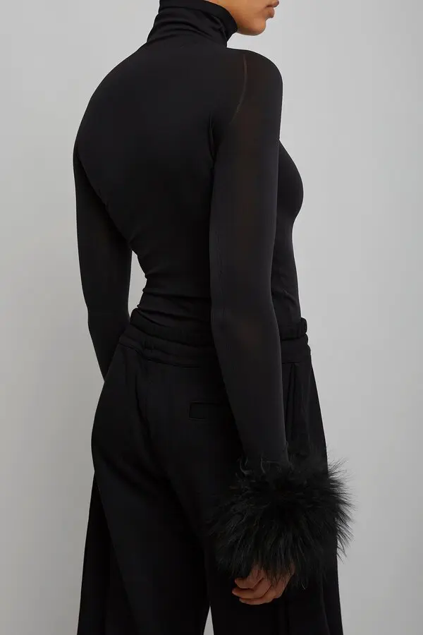 Alaïa Knitted Bodysuit With Fur Cuffs