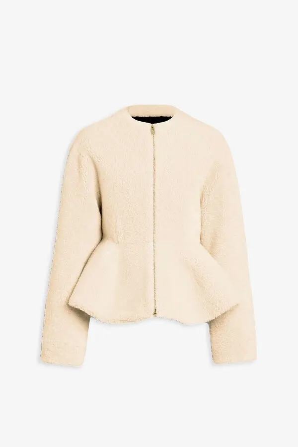 Alaïa Peplum Shearling Jacket