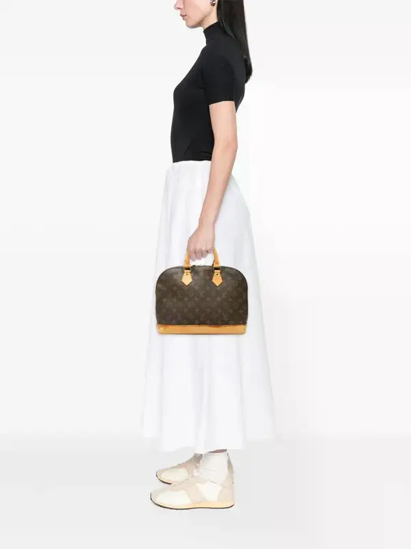 LOUIS VUITTON 1996 Monogram Alma Pm Handbag - Brown