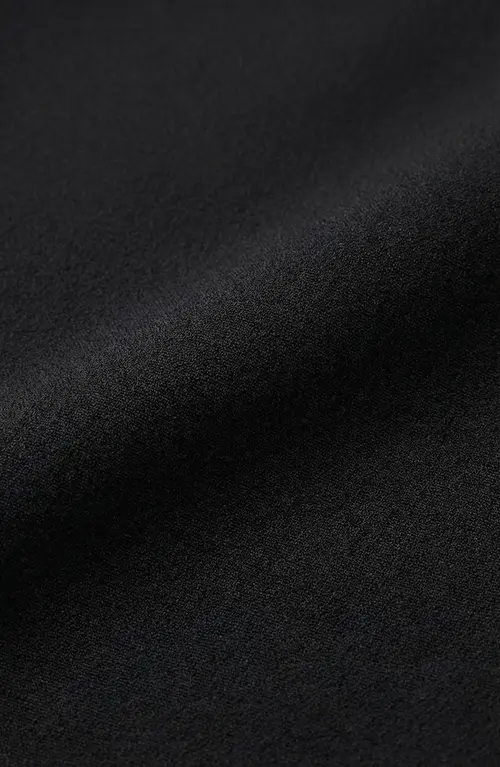 MODENAIRE Sleeveless Asymmetrical Button Top