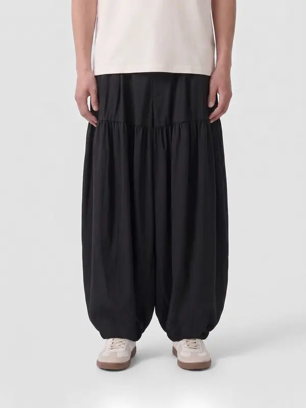 Comme Des Garçons Wide-leg Jersey Trousers With Elasticated Cuffs - Black