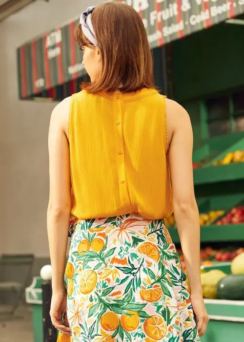 MODCLOTH Sleeveless Tie-neck Blouse With Lace Trim