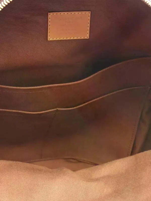LOUIS VUITTON Monogram Discovery Pm Backpack