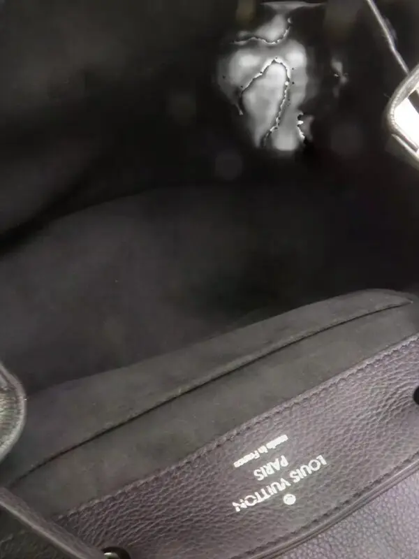 LOUIS VUITTON Lock Me Backpack