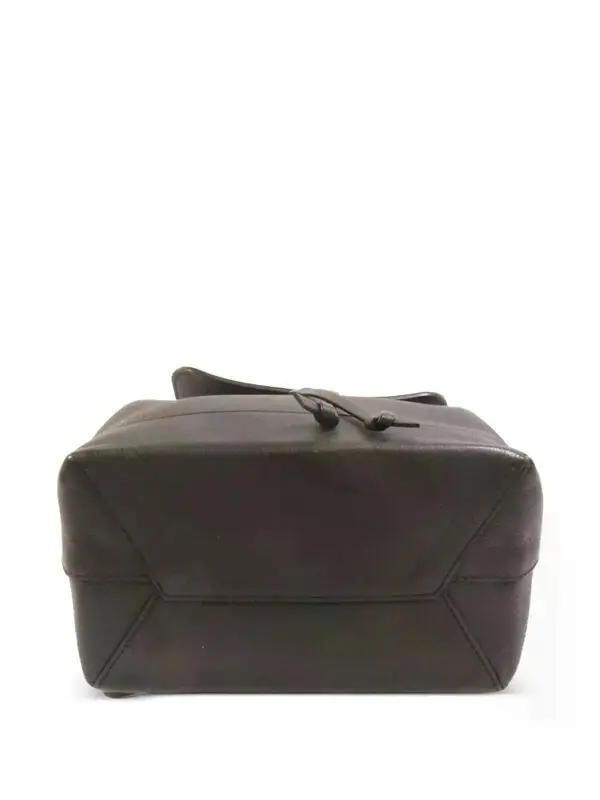 LOUIS VUITTON Lock Me Evergrain Leather Backpack