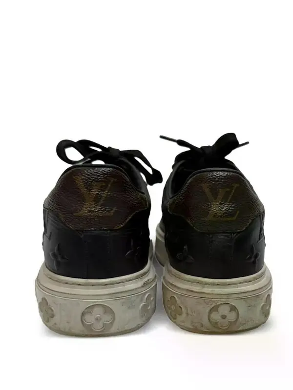 LOUIS VUITTON Leather Monogram Embossed "time Out" Sneakers - Black