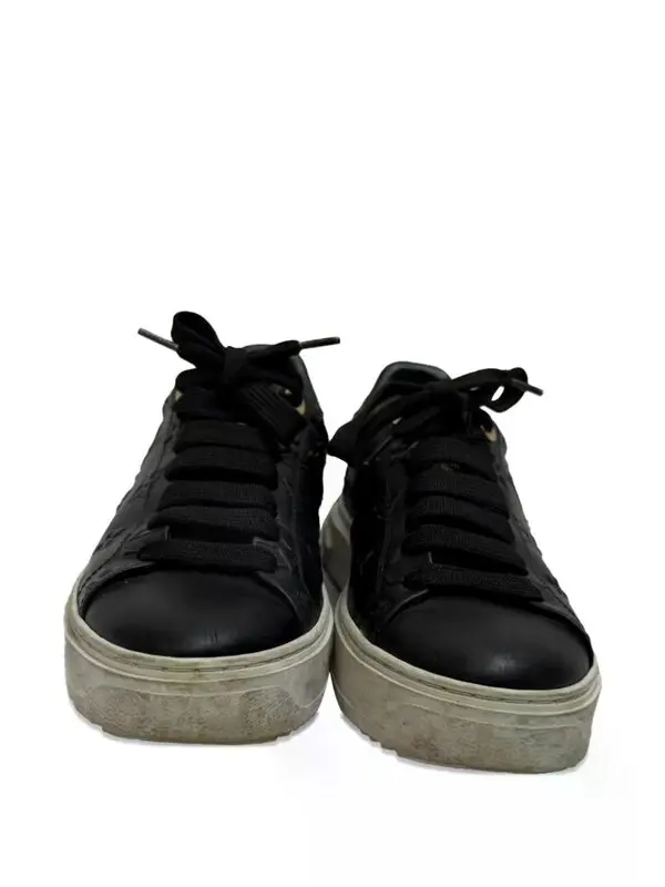 LOUIS VUITTON Leather Monogram Embossed Time Out Sneakers