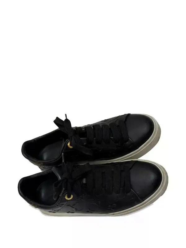 LOUIS VUITTON Leather Monogram Embossed Time Out Sneakers