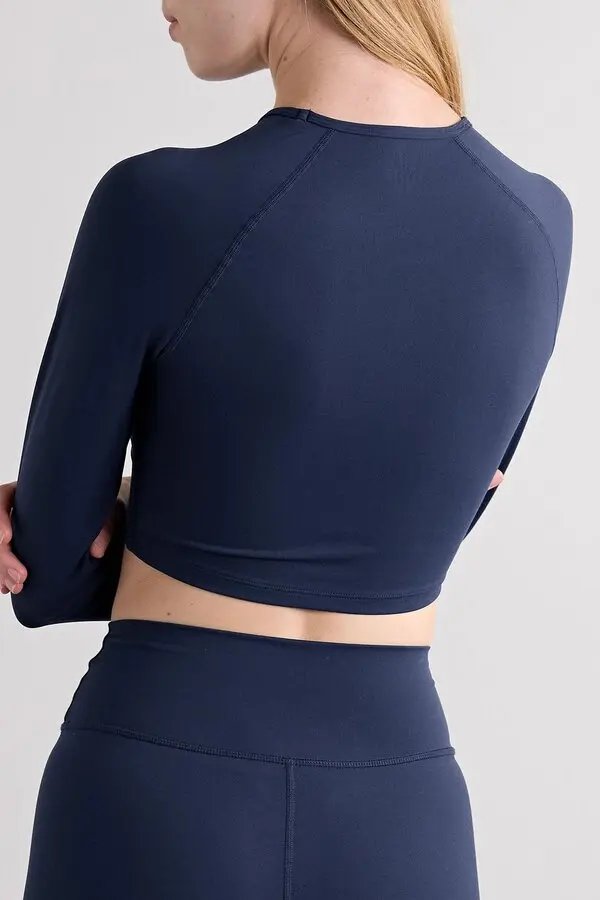SPORTY & RICH Serif Cropped Stretch Top