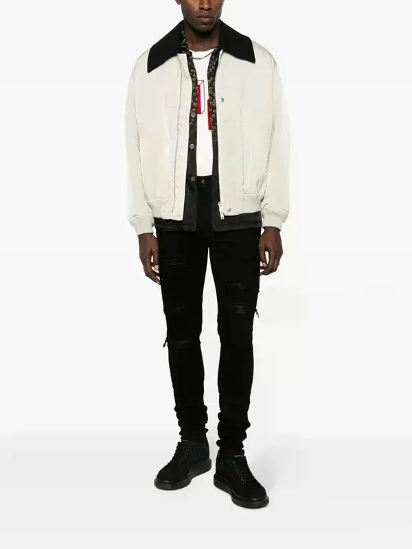 Amiri Cotton Blend Skinny Jeans With Distressed Details - Black