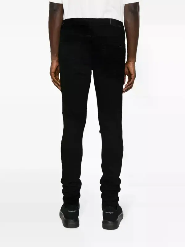 Amiri Cotton Blend Skinny Jeans With Distressed Details - Black
